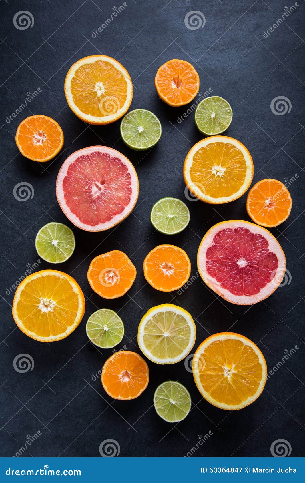 Citrus Half Cut Fruits on Dark Background Stock Image - Image of ...
