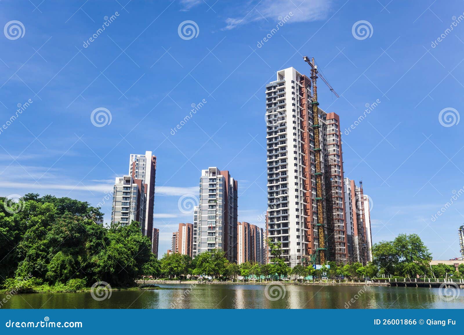 City building near a lake stock photo. Image of reflection - 26001866