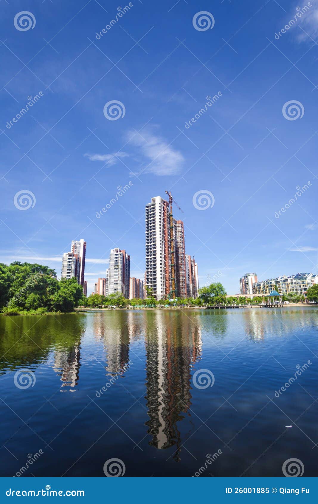 City building near a lake stock image. Image of crane - 26001885