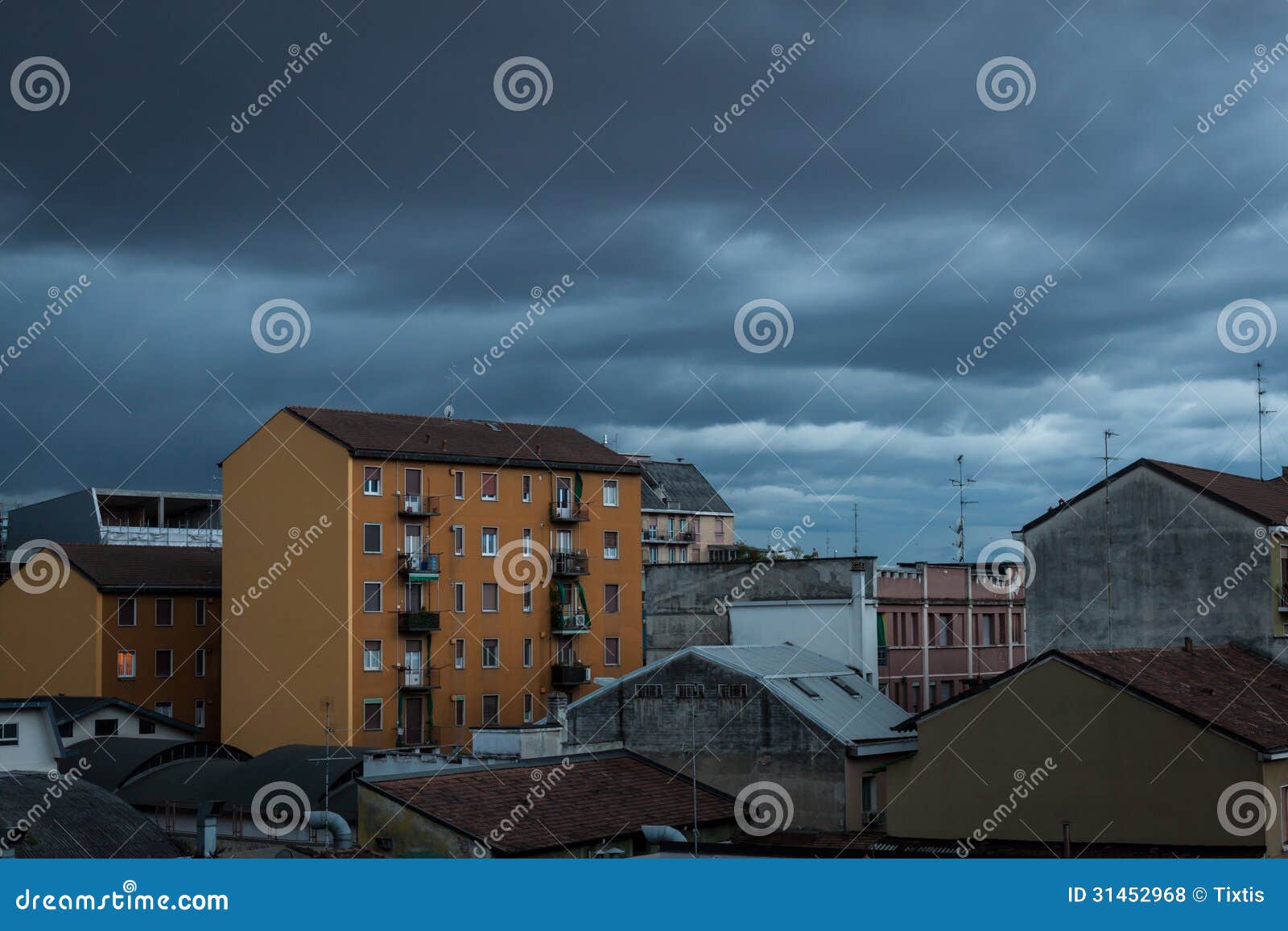 City Buildings Underneath Dramatic Sky Stock Photo - Image of ...