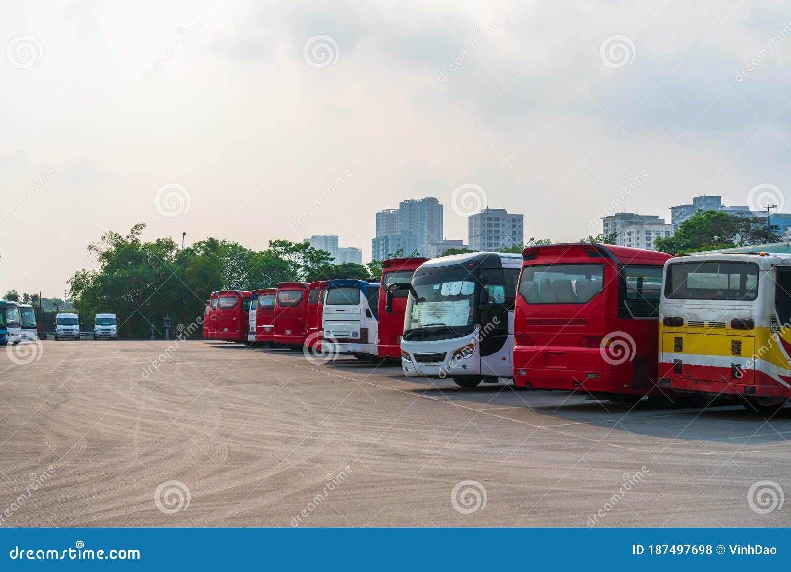 City Buses in the Parking Lot at the Bus Station Stock Photo - Image of ...