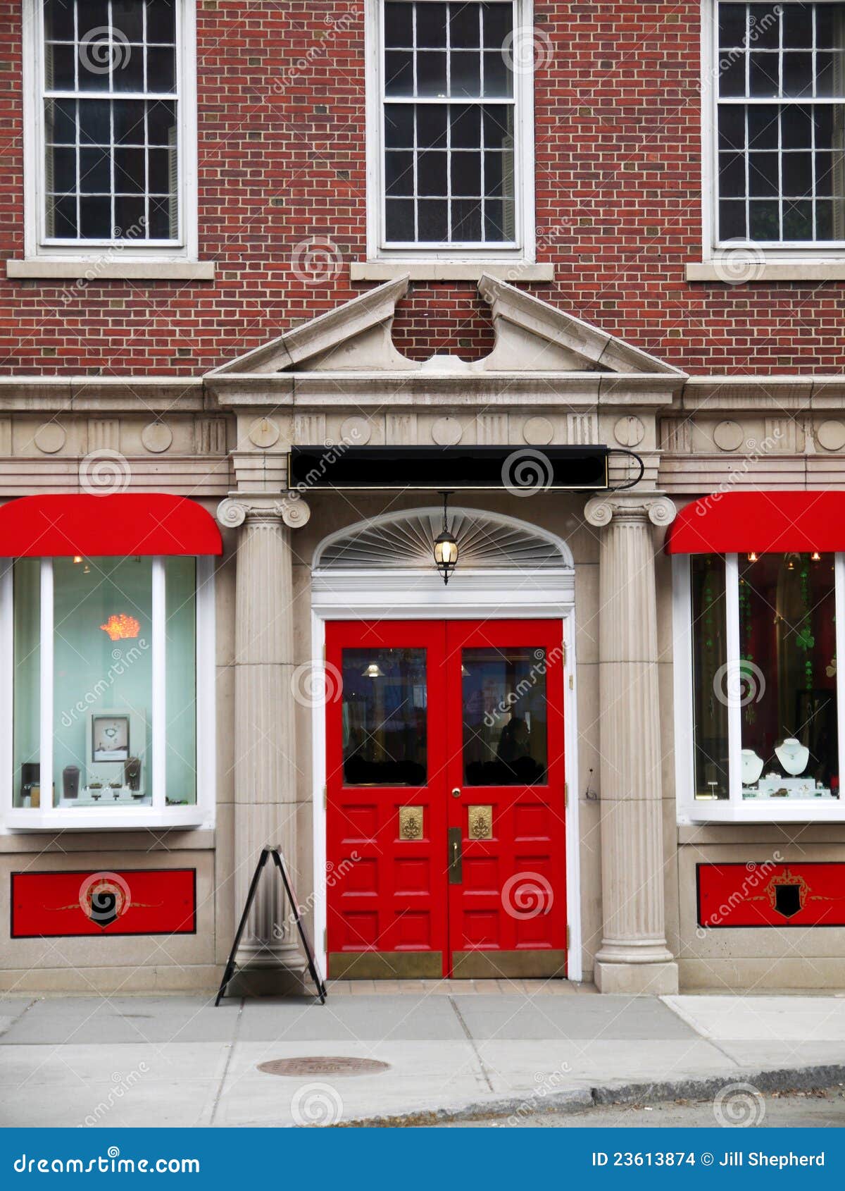 City: Elegant Red Store Front Stock Photo - Image of building, awnings ...