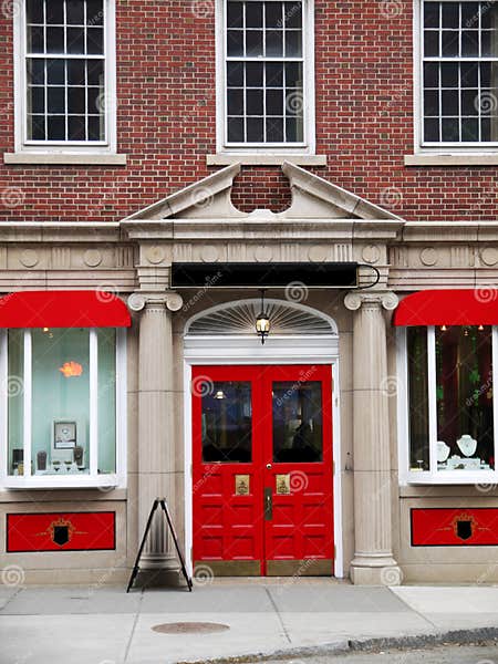 City: Elegant Red Store Front Stock Photo - Image of building, awnings ...