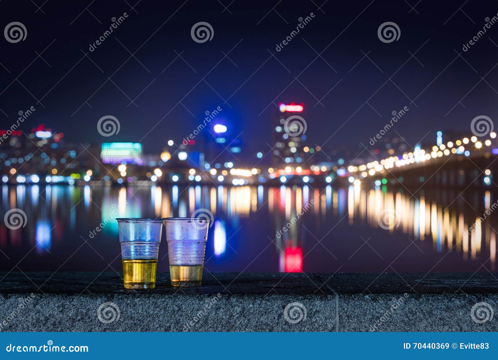 City at Night with Reflection in Water. Stock Image - Image of evening ...