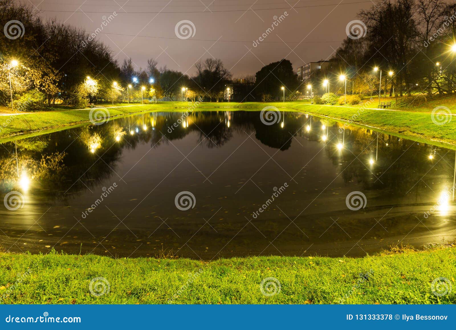 City Pond with Illumination Around the Radius with the Reflection of ...