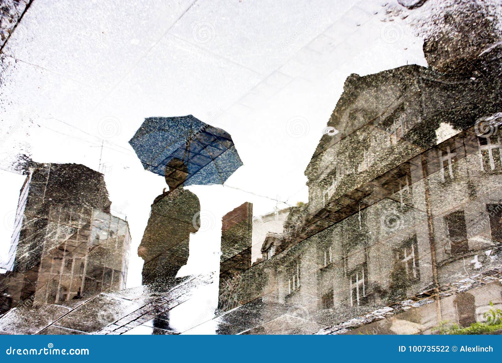 City Reflection in a Puddle Stock Photo - Image of architecture ...