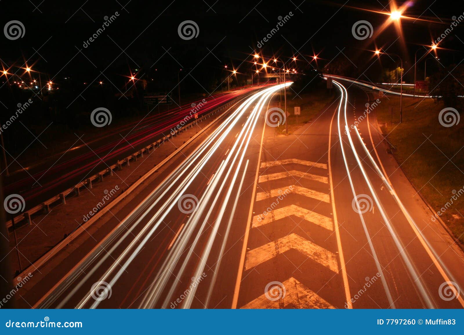 Light Streaks Of Cars Passing Through A Narrow Village Street With Old ...