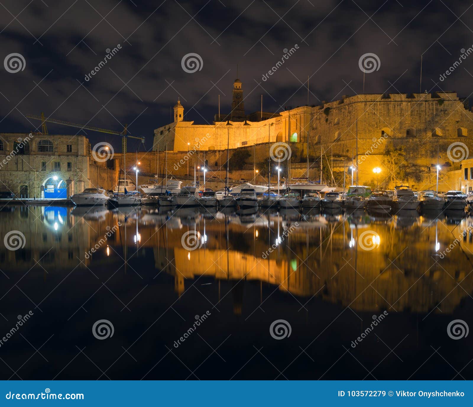 City Senglea at night stock image. Image of yachts, dock - 103572279