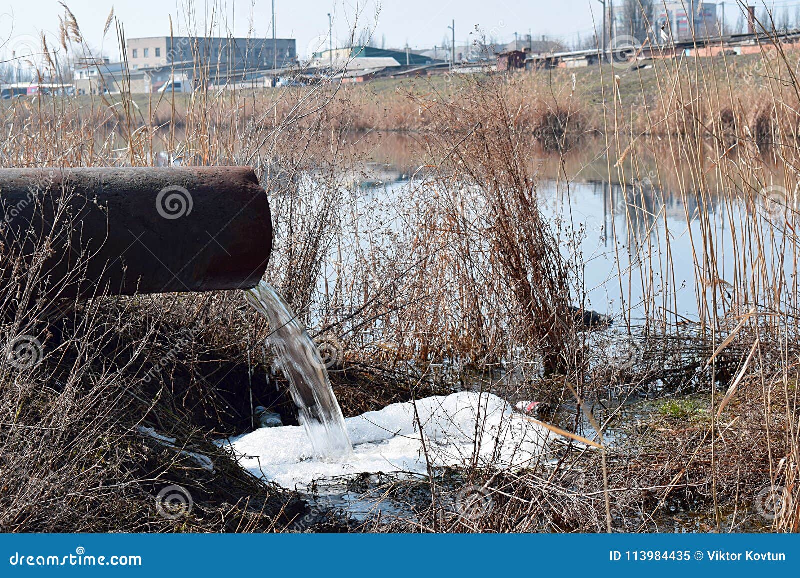 A Large Pipe from Which Sewage Flows into the River. Stock Image ...