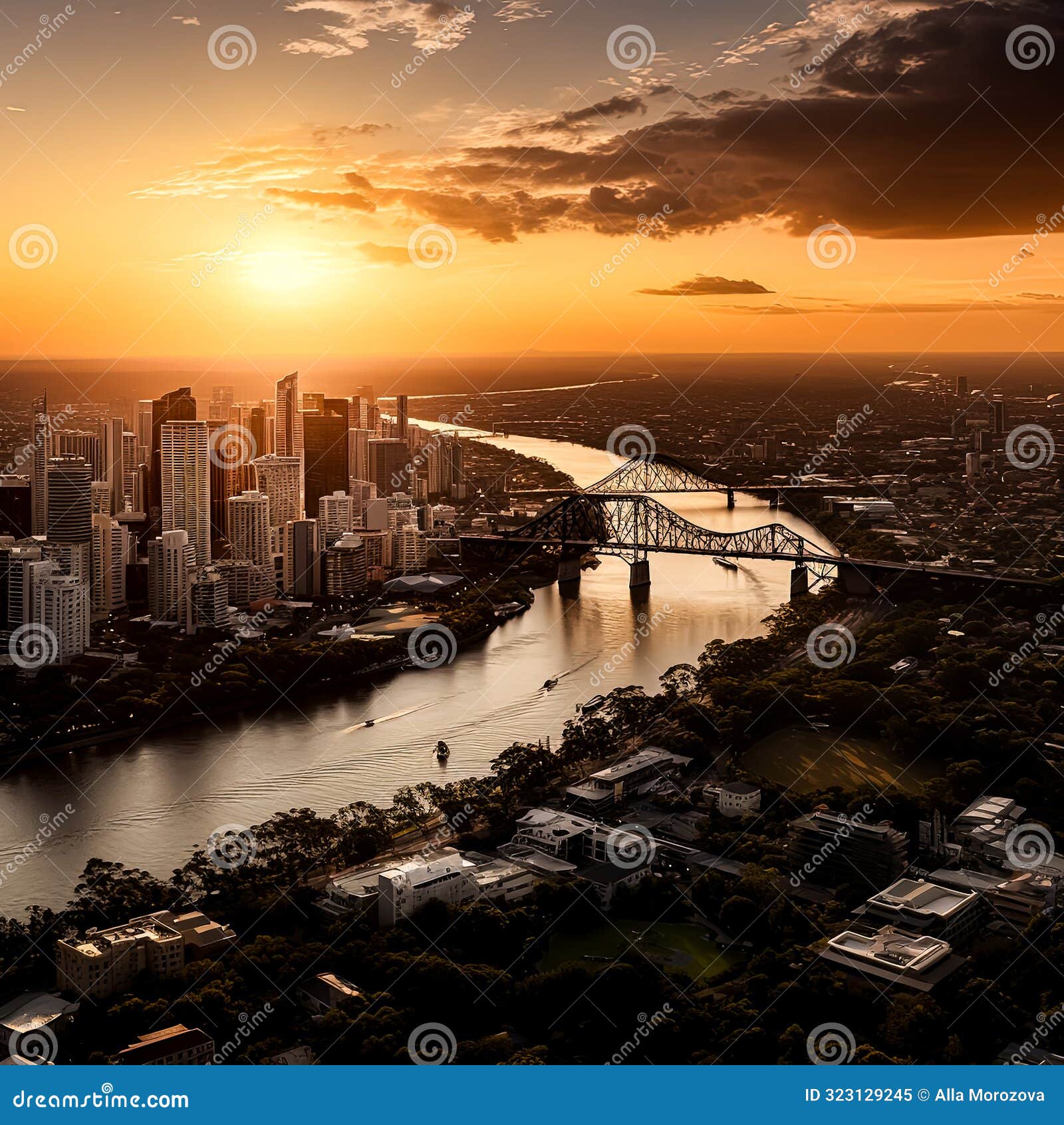 A City Skyline with a Bridge Over a River and the Sun Setting in the ...