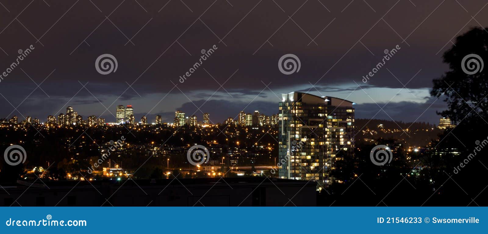 City Skyline at Dusk stock image. Image of downtown, clouds - 21546233
