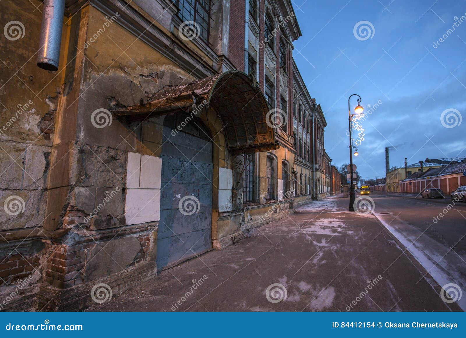 City Street with Crumbling Building Stock Photo - Image of wall ...