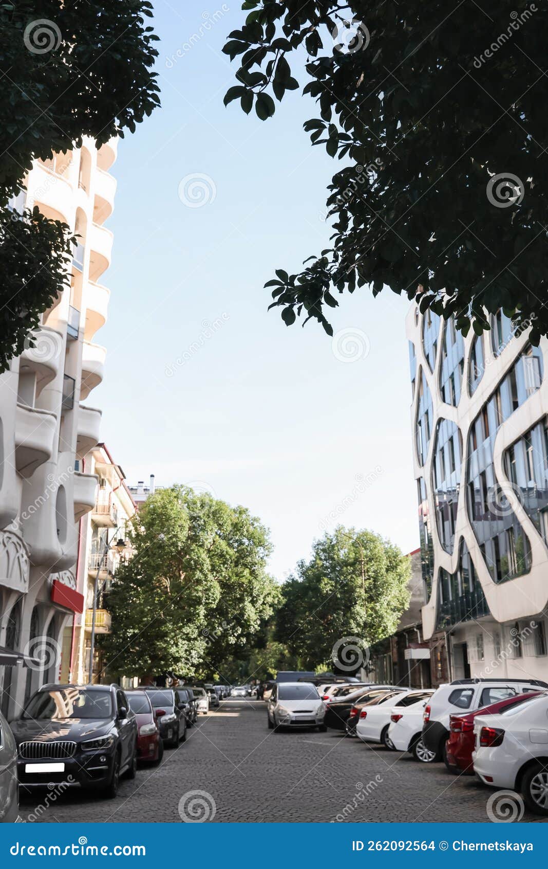 City Street with Modern Buildings and Trees Stock Photo - Image of ...