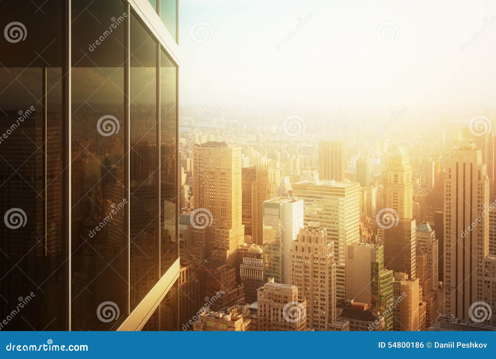 Cityscape Reflected in the Glass of an Office Building at Sunset Stock ...