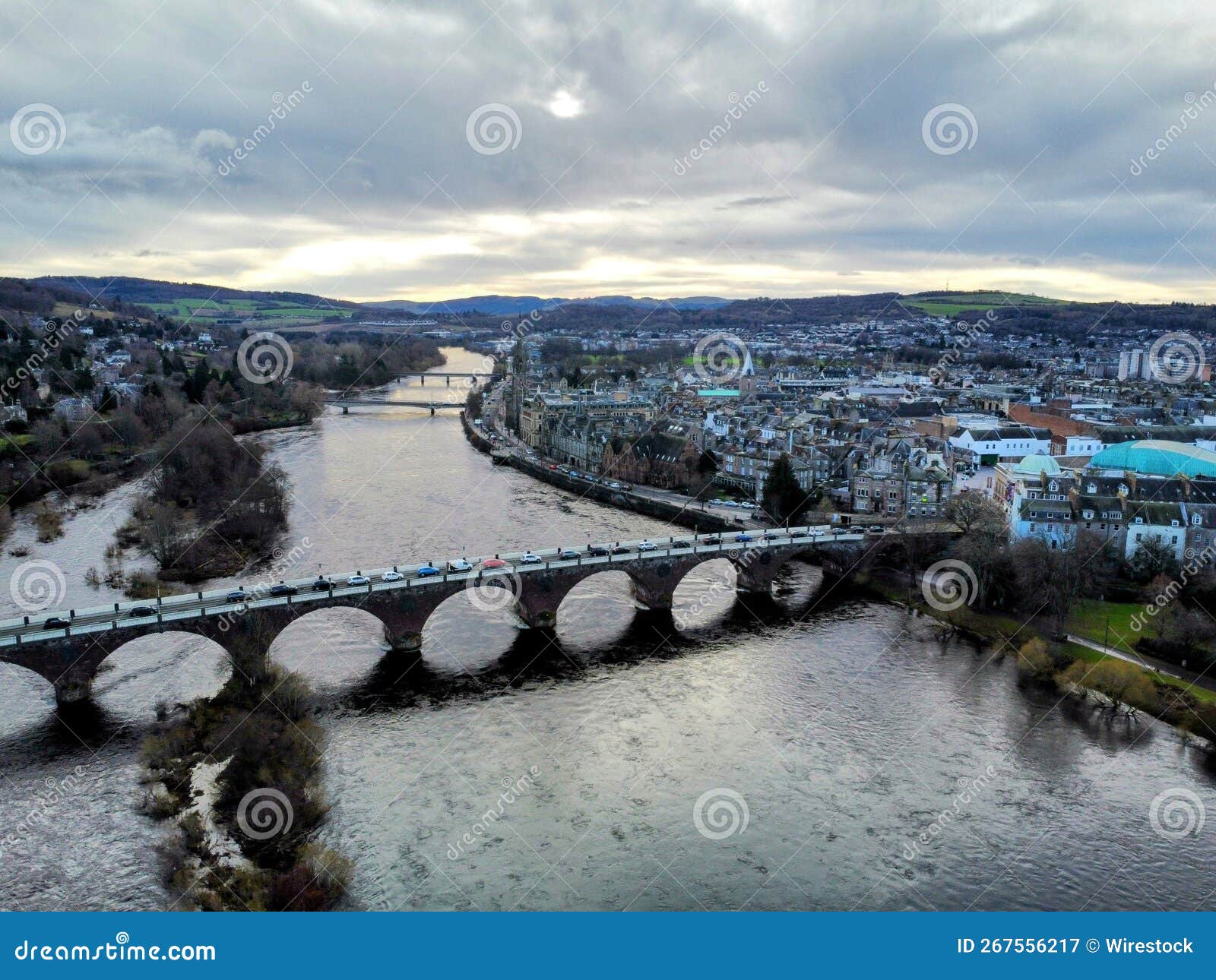 Cityscape on a River Shore during Sunset Stock Image - Image of ...