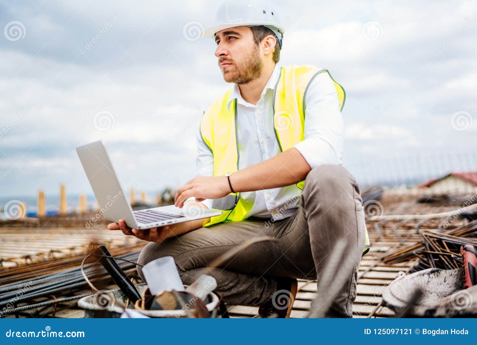 Civil Construction Engineer, Working with Laptop on Construction Site ...