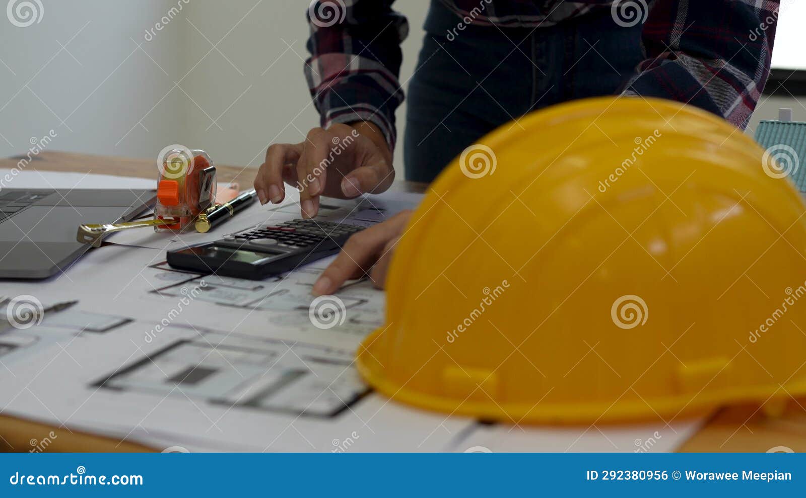 Civil Engineer or Architect Calculator and Working with Blueprint ...