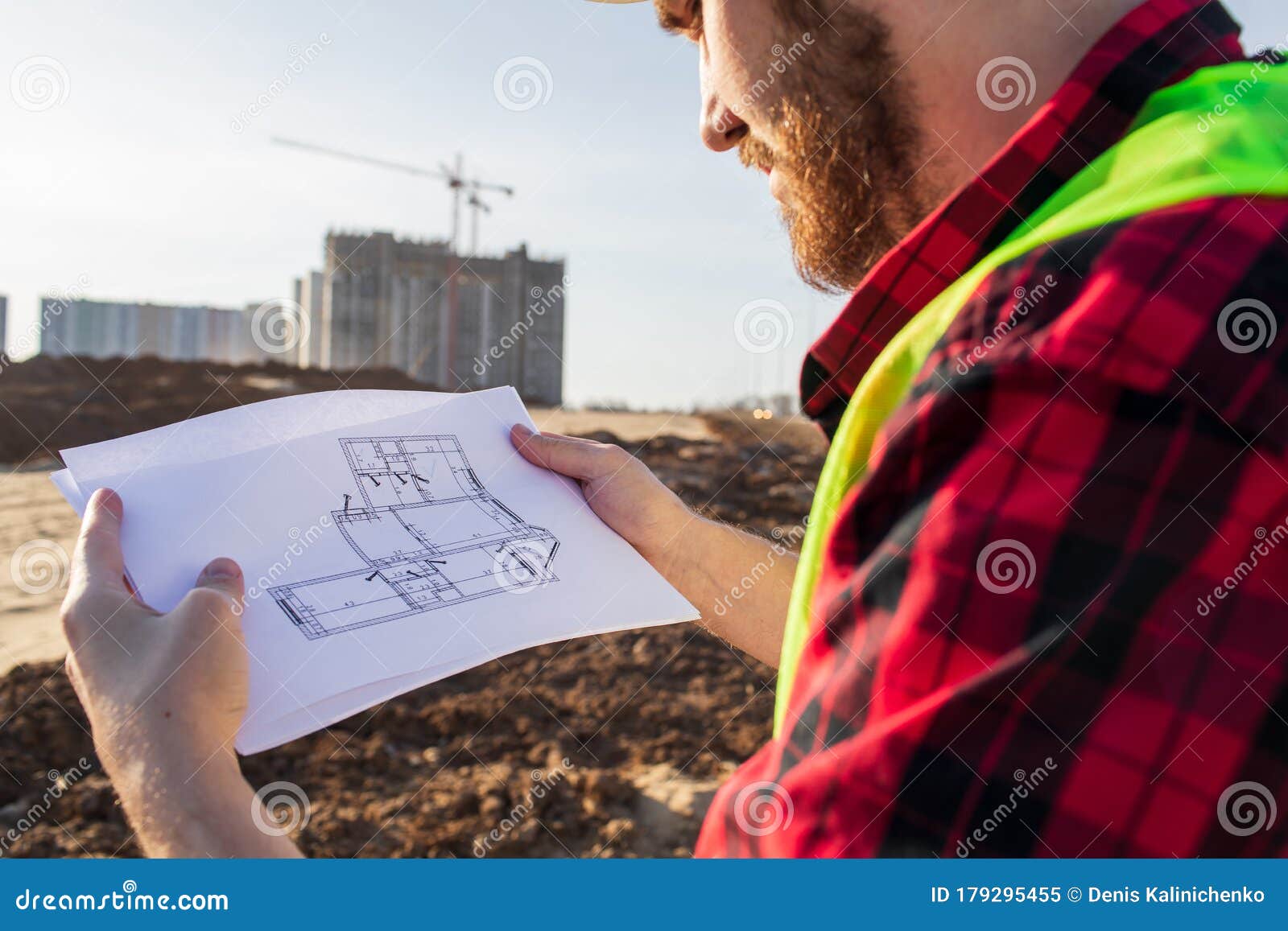 Civil Engineer Checking Work for Communication To Management Team in ...