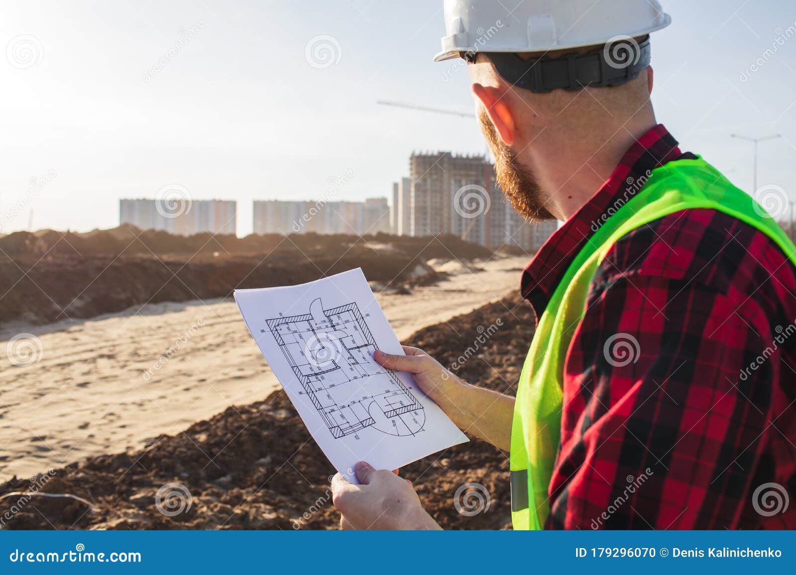 Civil Engineer Checking Work for Communication To Management Team in ...