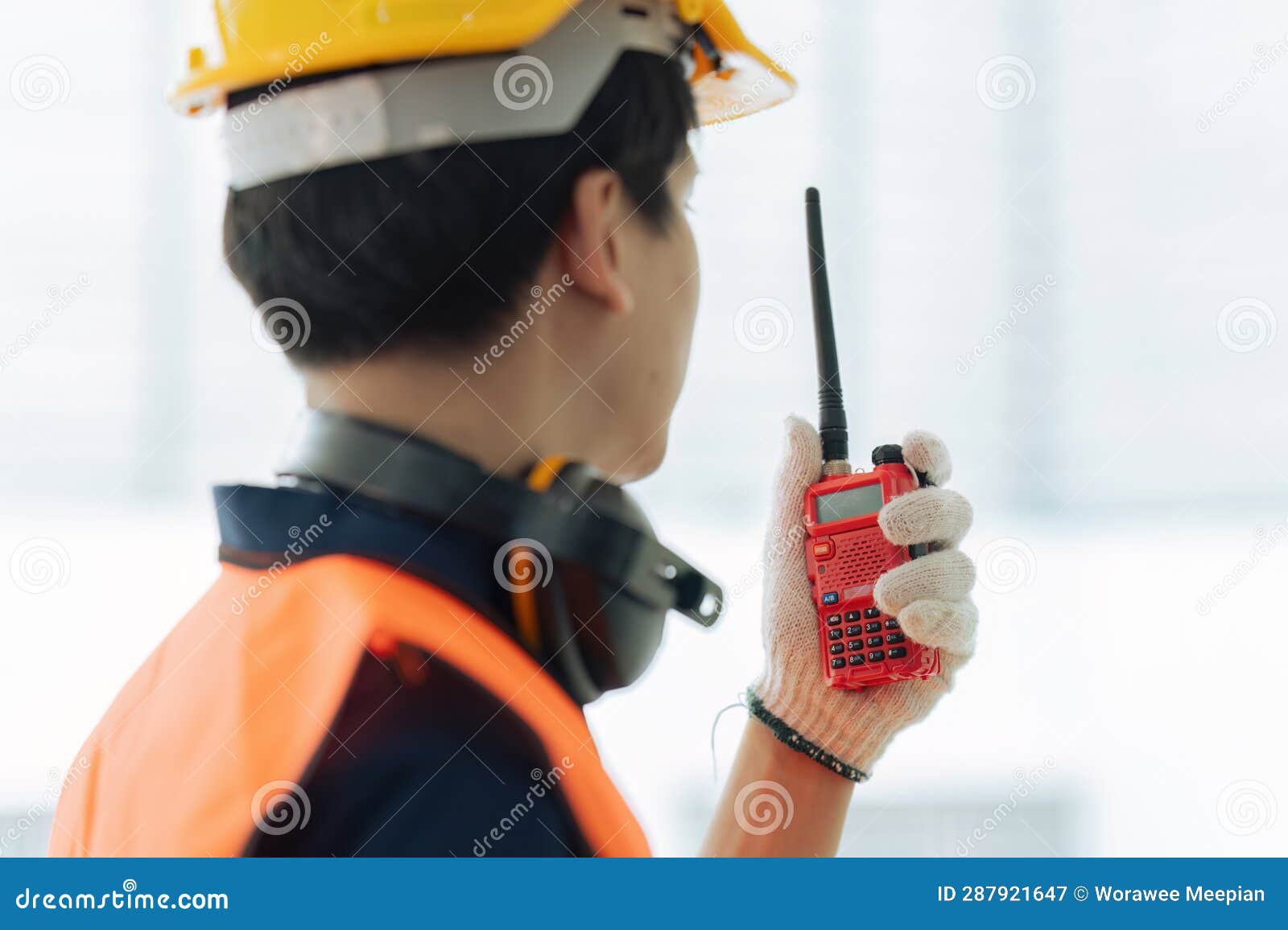 Civil Engineer Construction Leader Holding and Using Walkie-talkie on ...