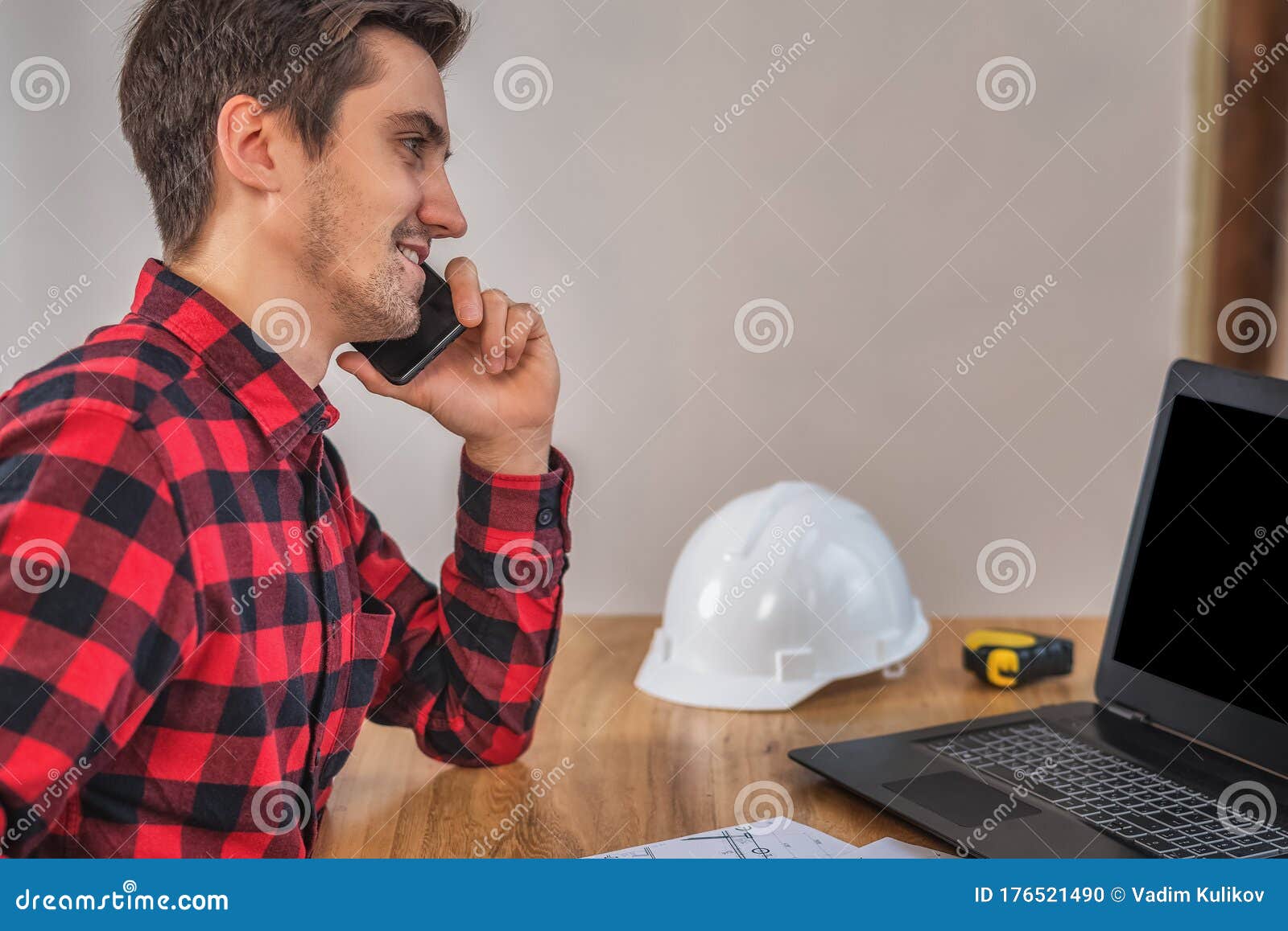 Civil Engineer at His Desk Working with Documents Stock Photo - Image ...