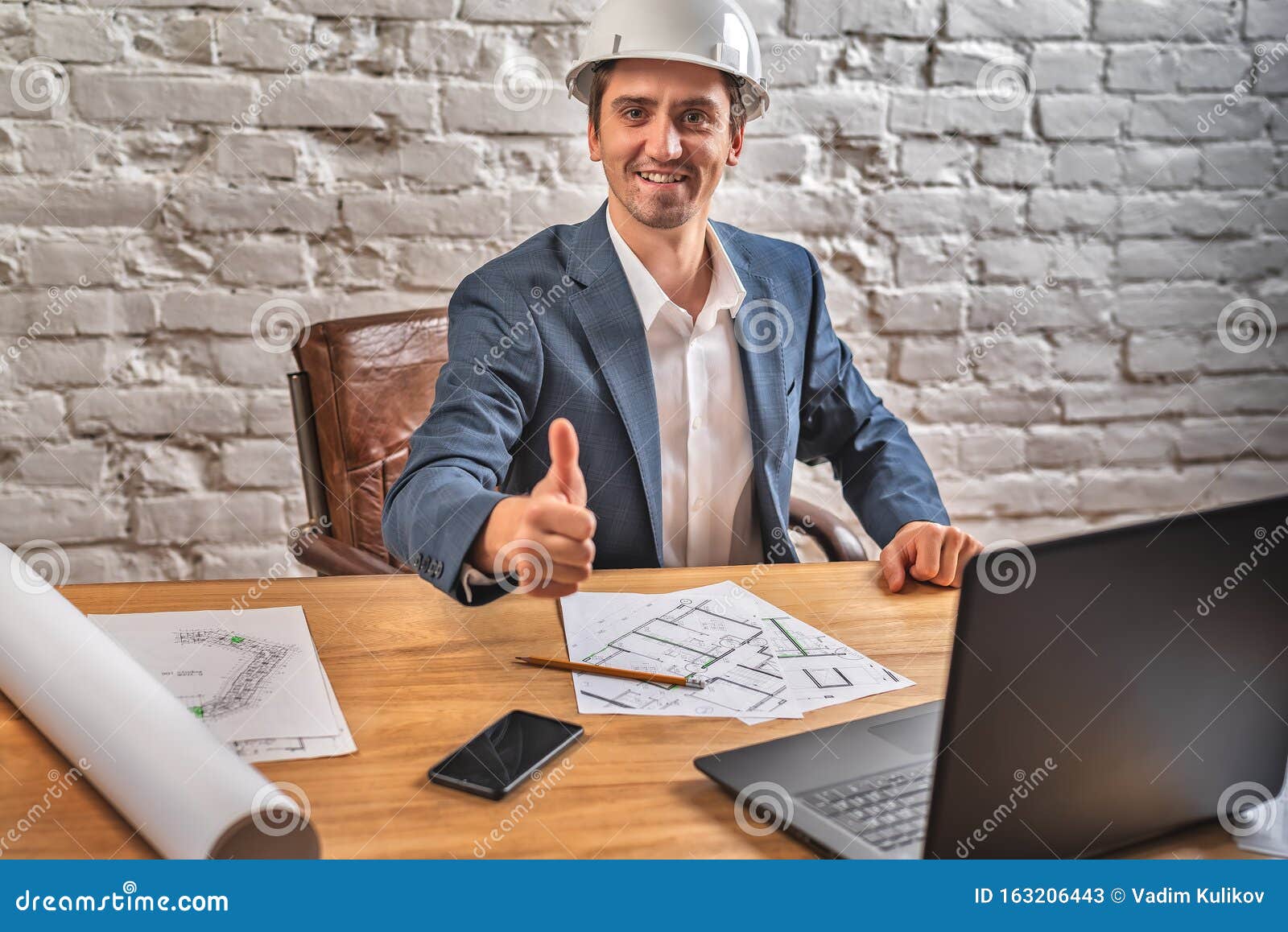 Civil Engineer at His Desk Working with Documents Stock Image - Image ...