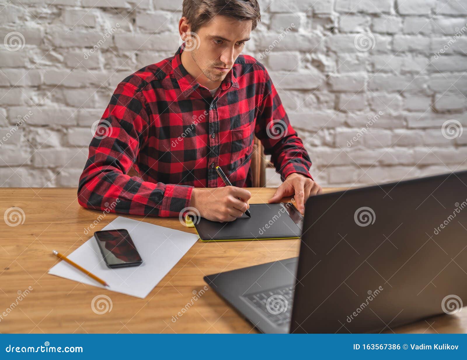 Civil Engineer at His Desk Working with Documents Stock Photo - Image ...