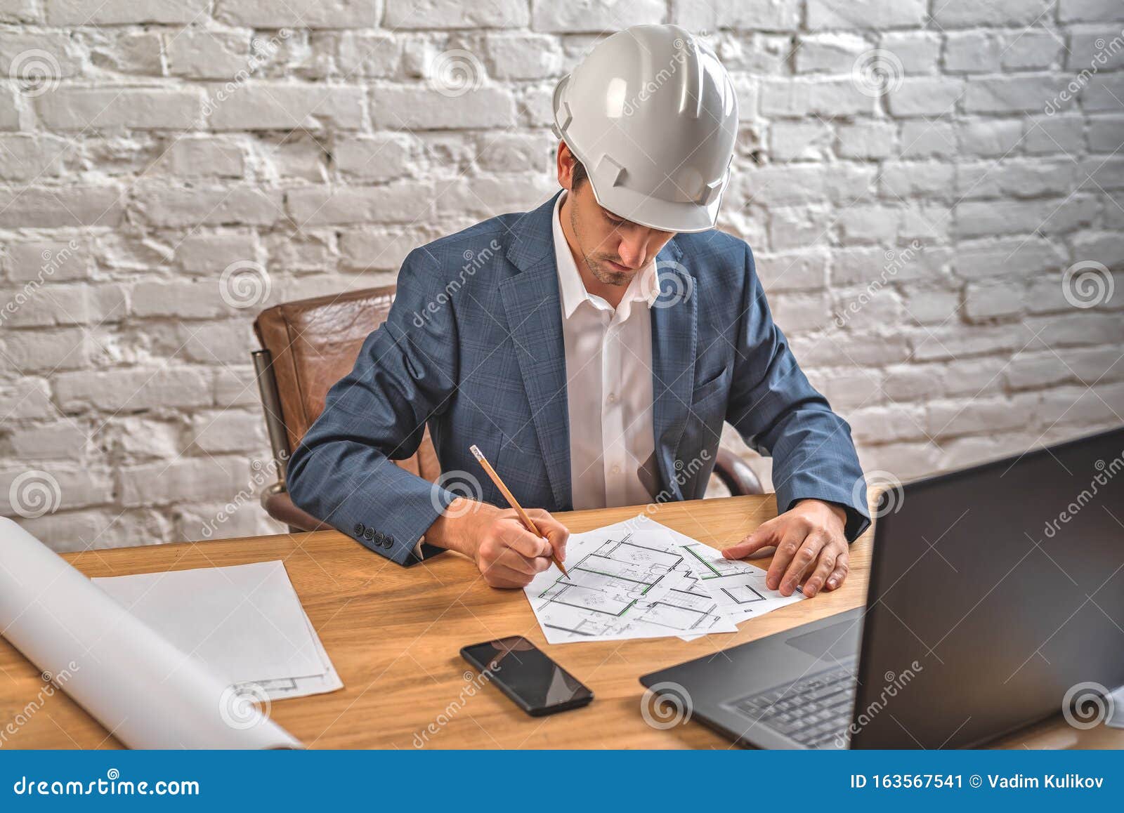 Civil Engineer at His Desk Working with Documents Stock Image - Image ...