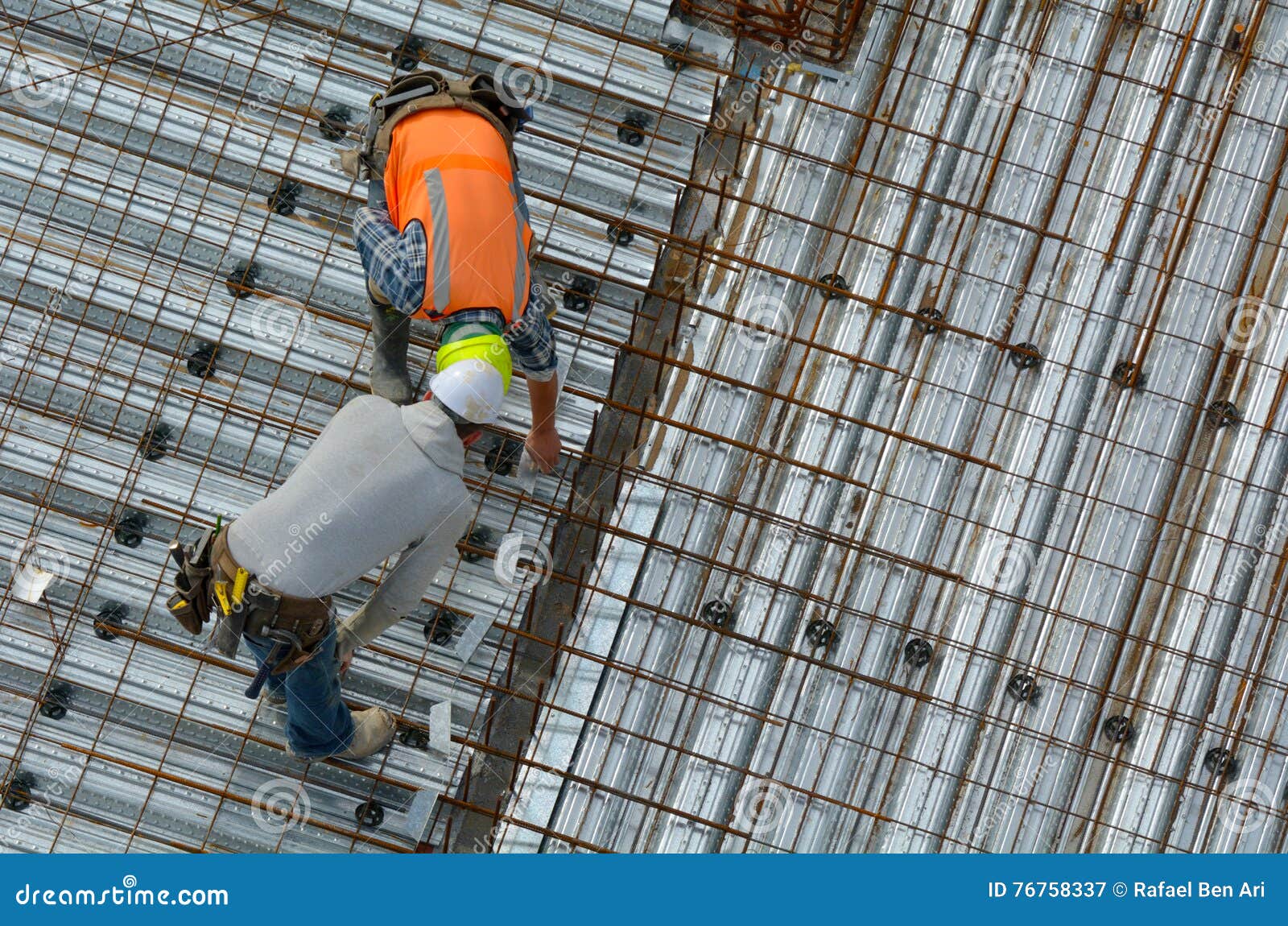 Civil Engineer Inspecting the Work Progress of a Worker in a Con Stock ...