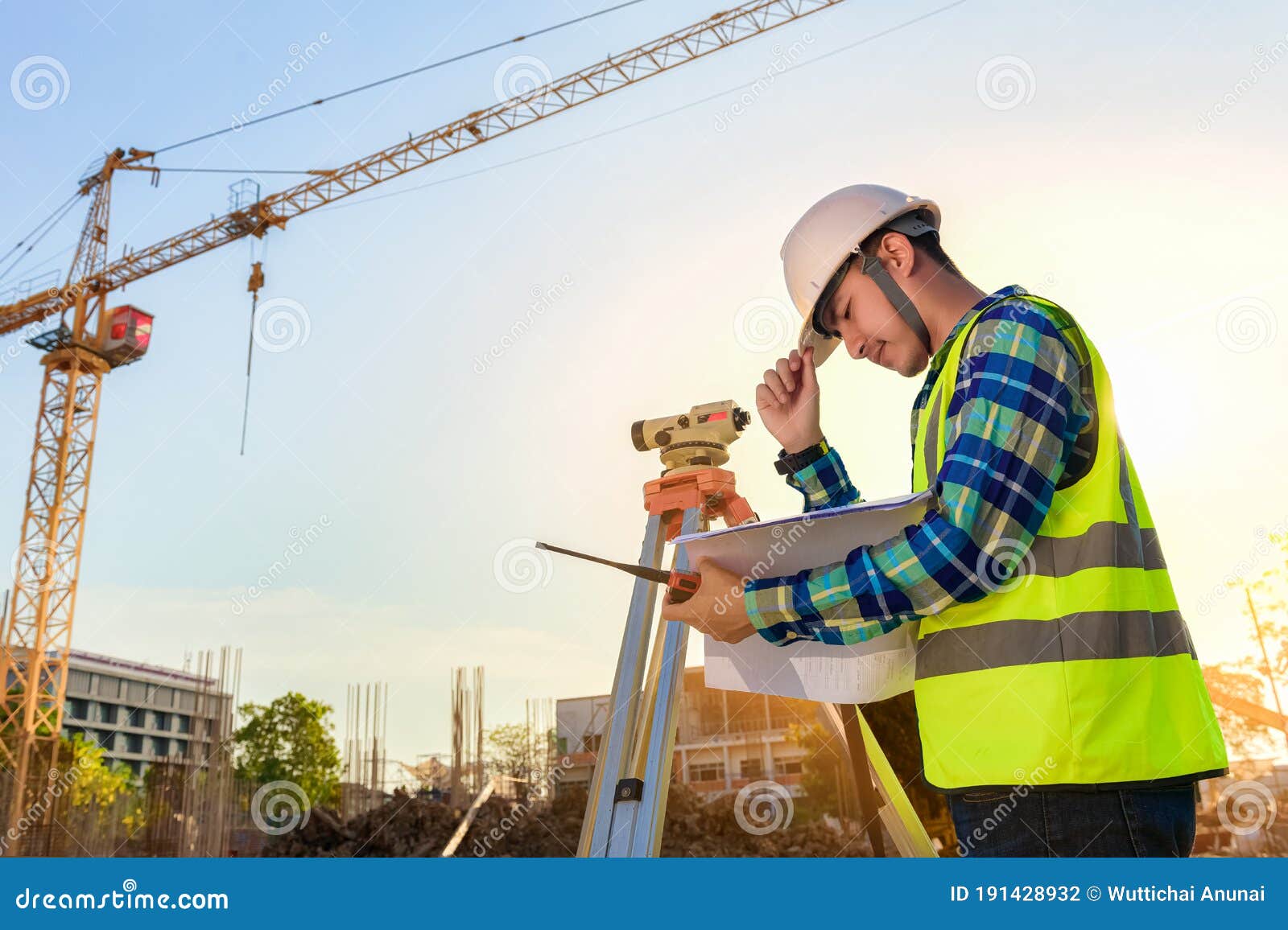 Civil Engineer Inspects Work Using Radio Communication with the ...