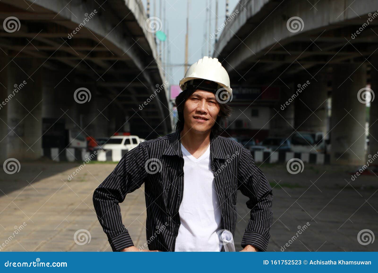Civil Engineer Man with White Helmet, Standing with Project Drafts in ...