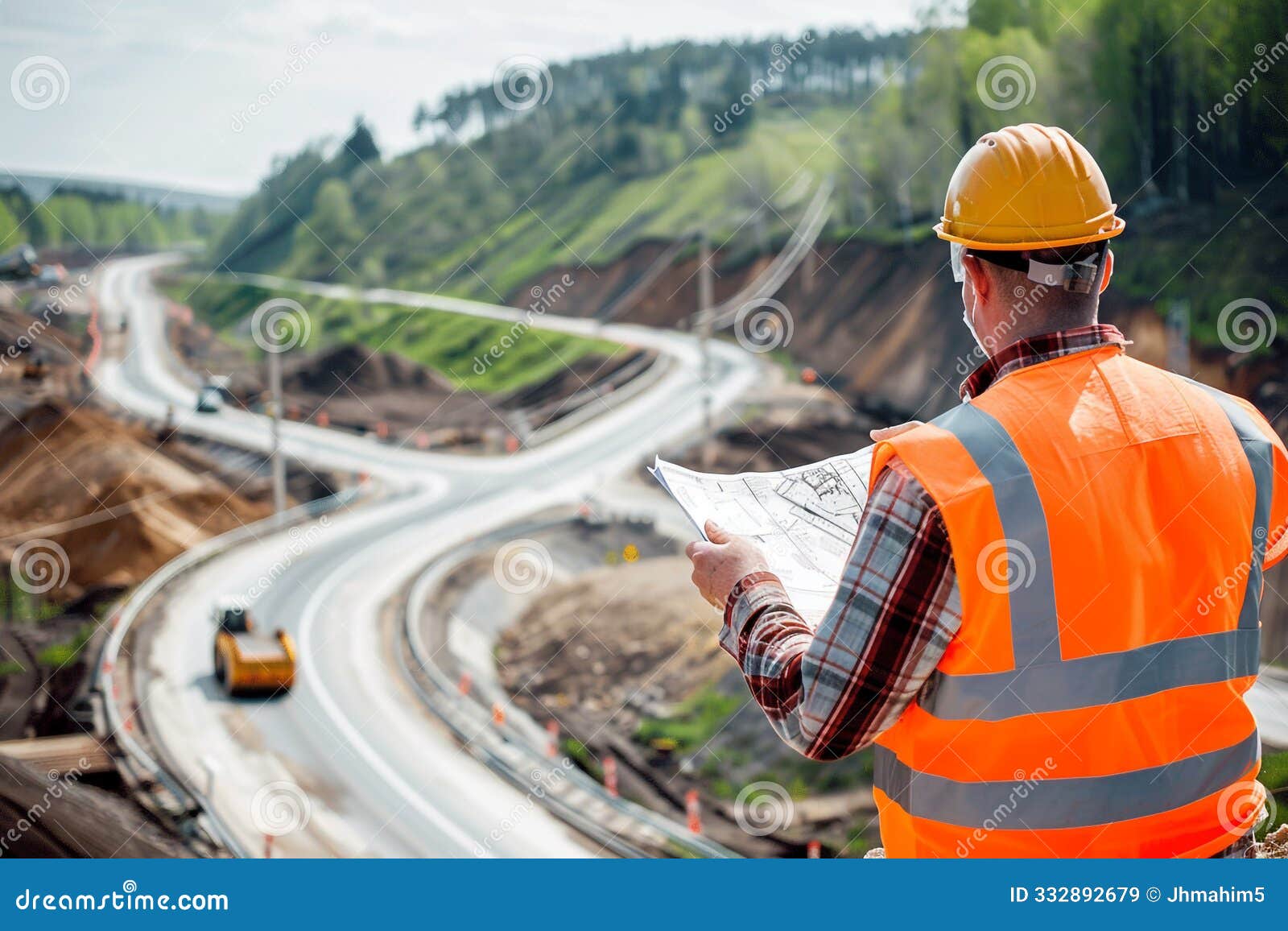 Civil Engineer Overseeing Earthwork and Paving on an Overpass ...