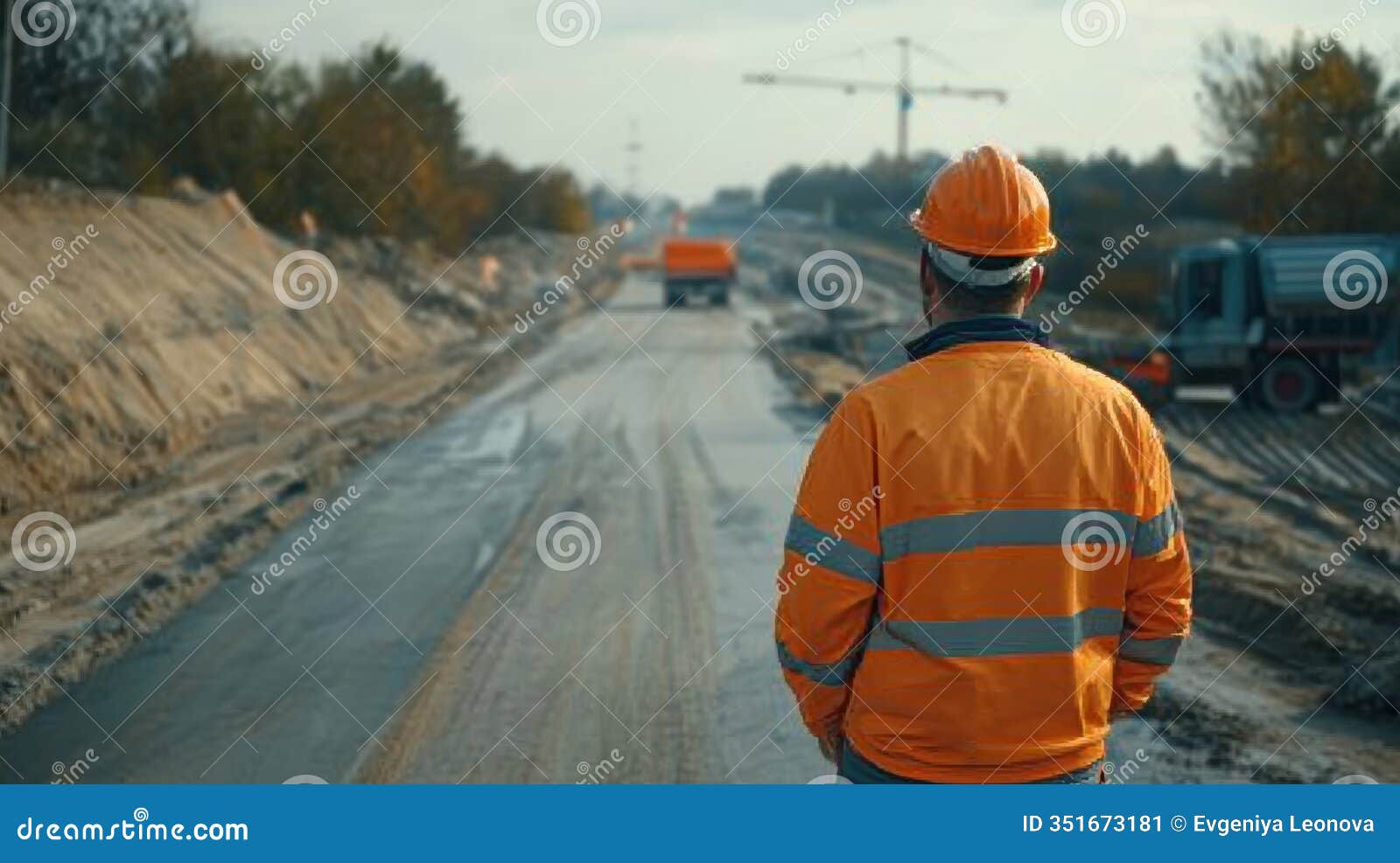 Civil Engineer Overseeing Road Construction and Supervising Major ...