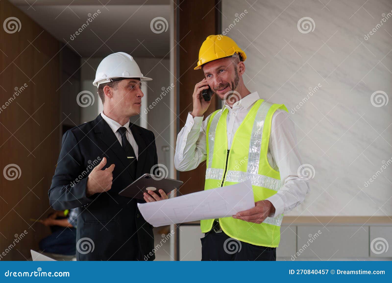 Civil Engineer Team Helmets Hardhat on Construction Site and Working ...