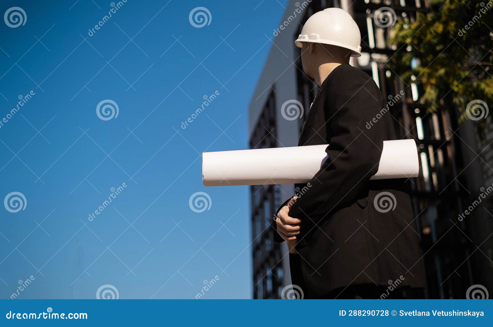 Civil Engineer Using a Tablet, Planning a Project, Builds a Modern ...