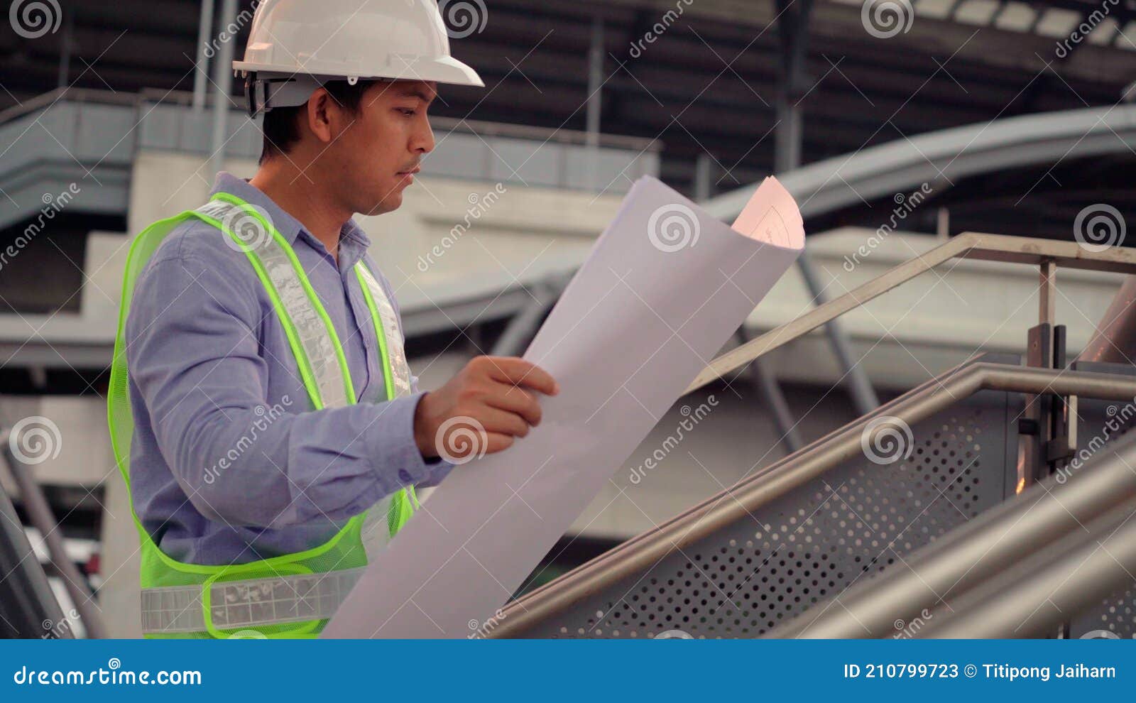 Civil Engineer Work Inspecting Architect Drawing on Construction Site ...