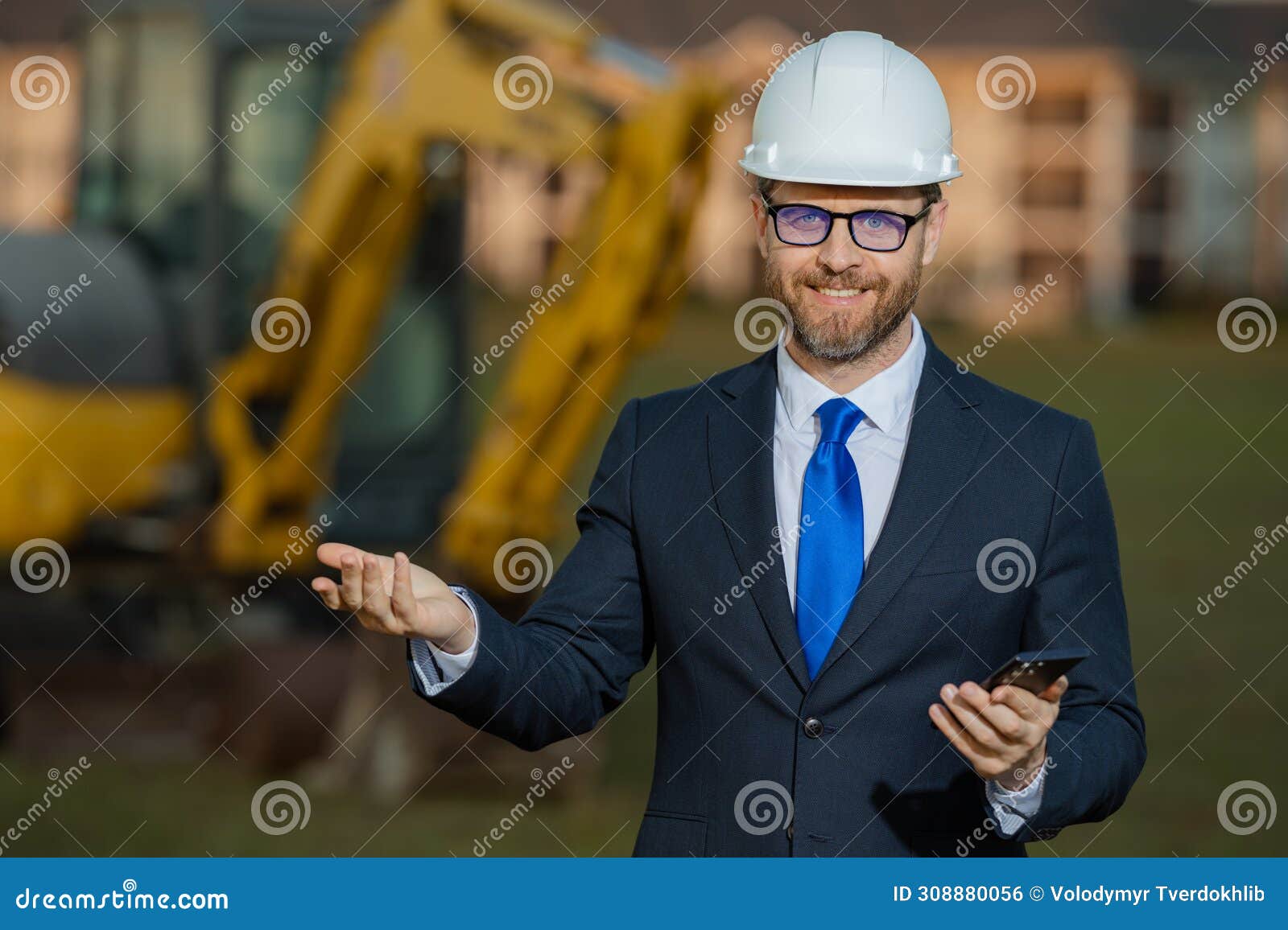 Civil Engineer Worker at a Construction Site. Mature Engineer Worker ...