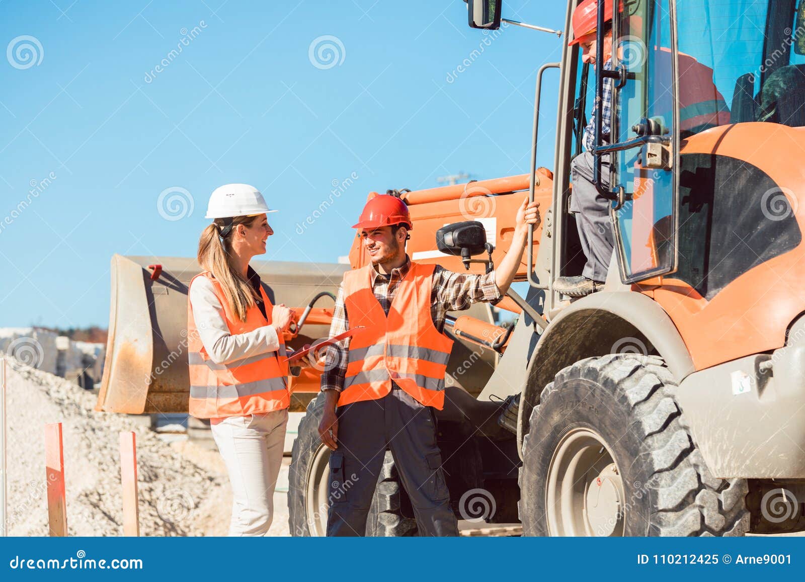 Civil Engineer and Worker Discussion on Road Construction Site Stock ...