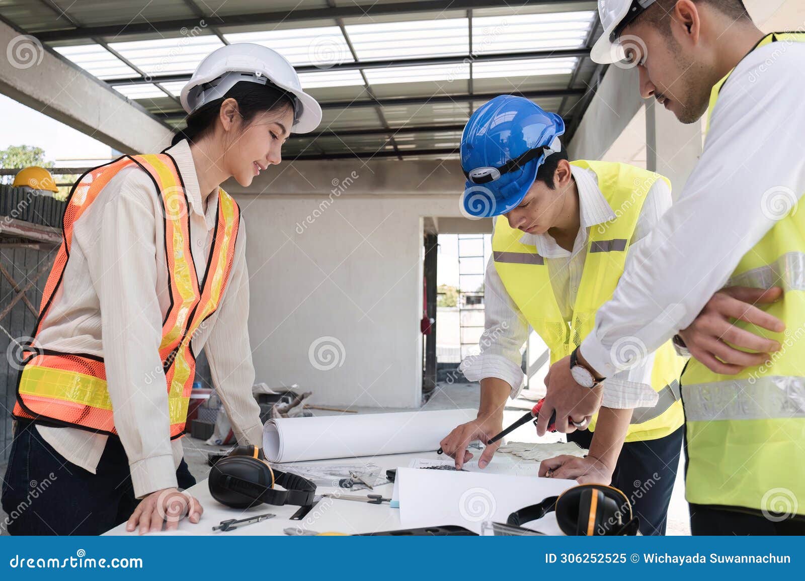 Civil Engineering Team Meets To Plan Work on Construction Project in ...