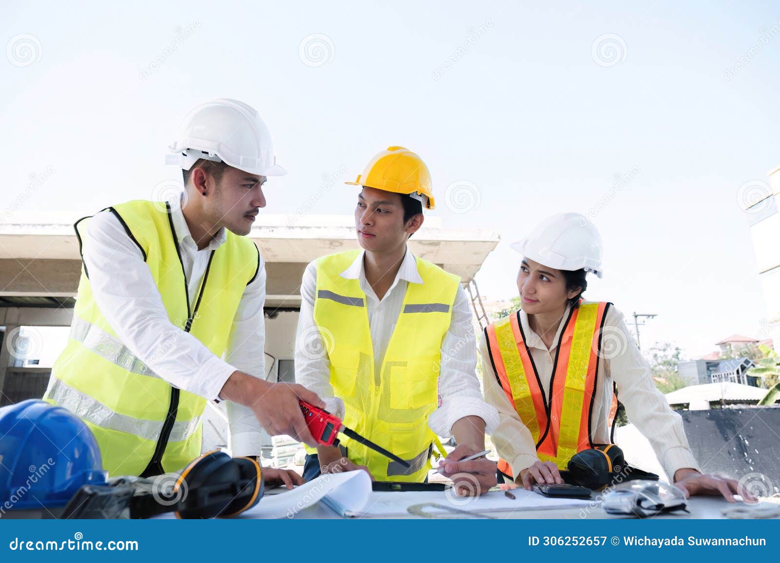 Civil Engineering Team Meets To Plan Work on Construction Project in ...
