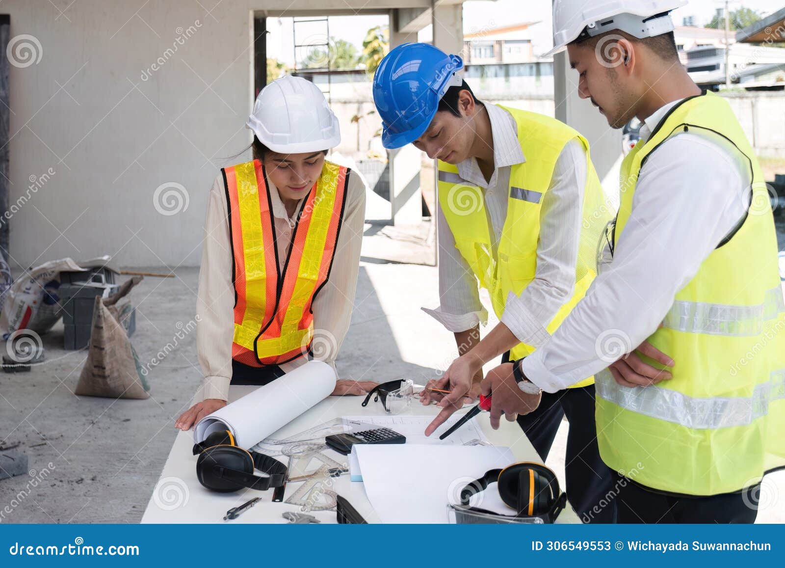 Civil Engineering Team Meets To Plan Work on Construction Project in ...