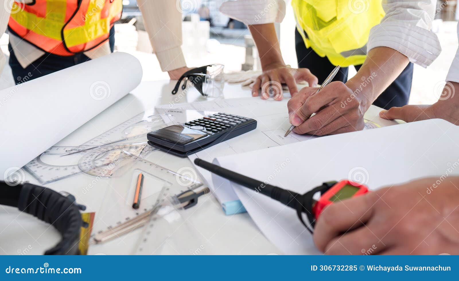 Civil Engineering Team Meets To Plan Work on Construction Project in ...