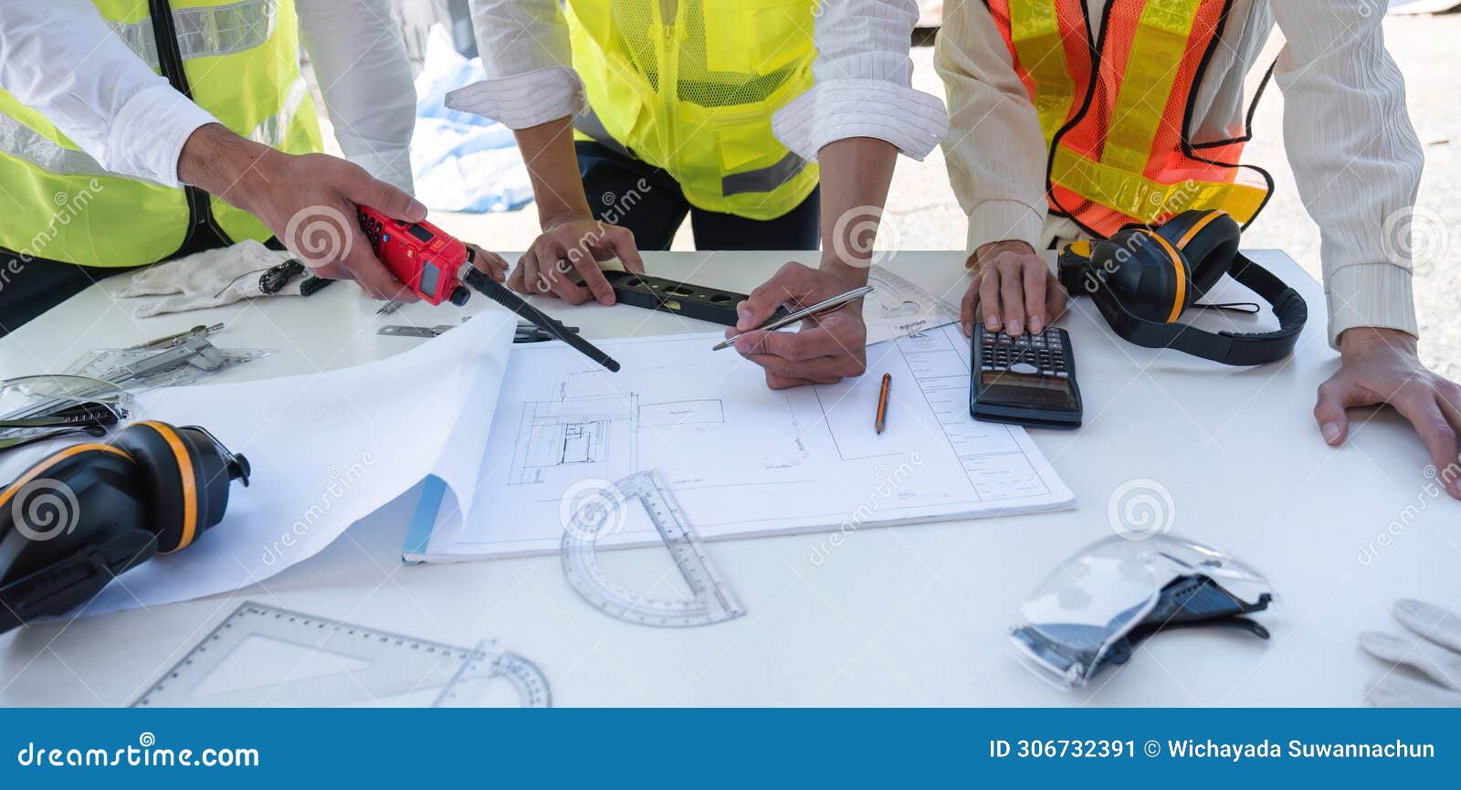 Civil Engineering Team Meets To Plan Work on Construction Project in ...