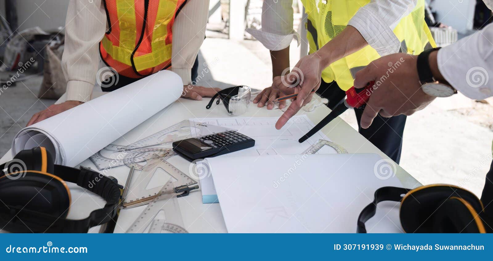 Civil Engineering Team Meets To Plan Work on Construction Project in ...