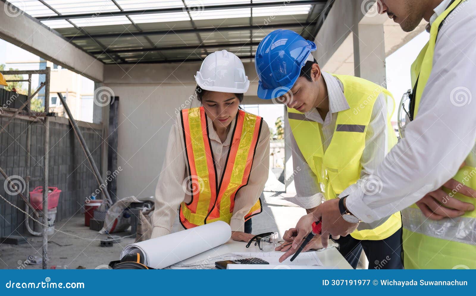 Civil Engineering Team Meets To Plan Work on Construction Project in ...