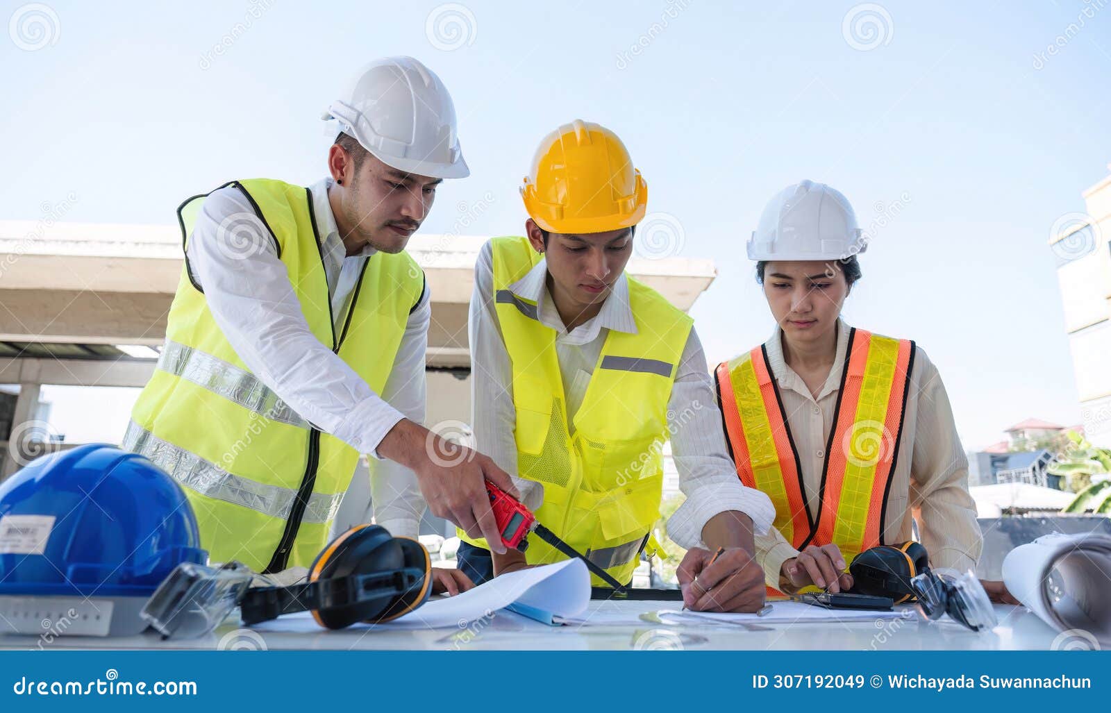 Civil Engineering Team Meets To Plan Work on Construction Project in ...