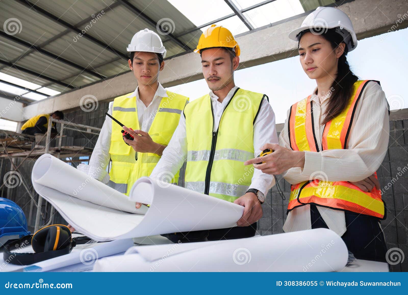 Civil Engineering Team Meets To Plan Work on Construction Project in ...