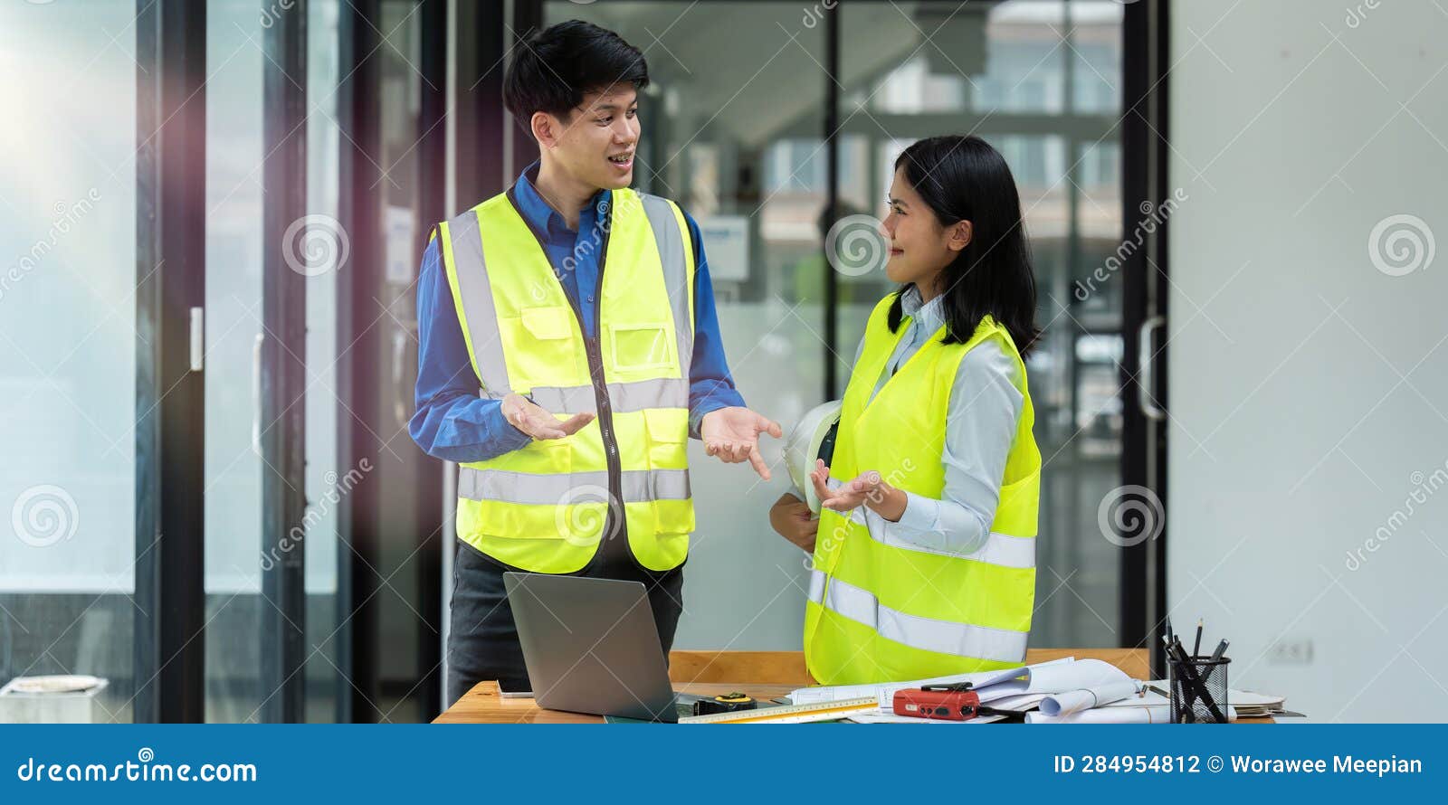 Civil Engineers and Architects Discuss Project Construction Together at ...