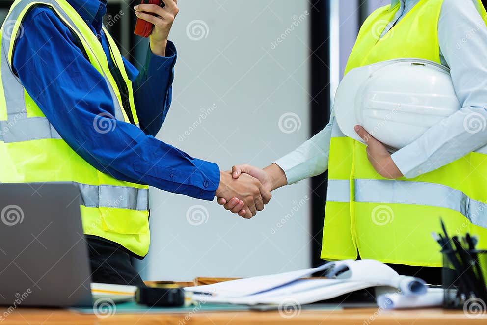 Civil Engineers and Architects Shank Hands after Work Done at Office ...