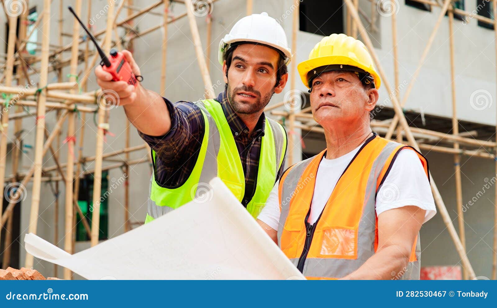 Civil Engineers Team with Safety Hard Hat Working Together at ...